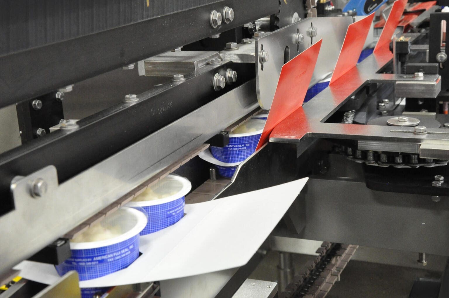Apex™ Sleever | Sleever Machine | Paperboard | Products | Douglas